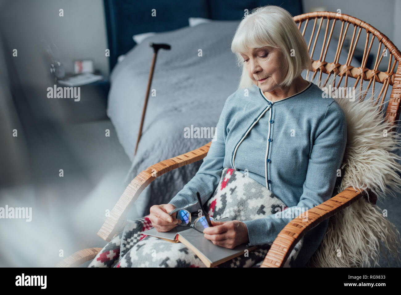 Old woman rocking chair hi-res stock photography and images - Alamy