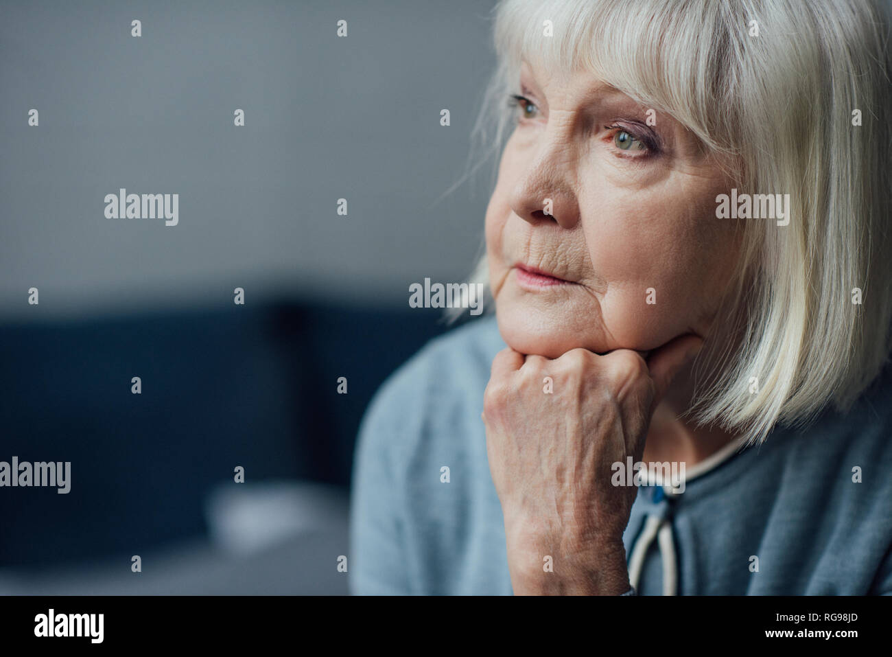 Propping chin with hand hi-res stock photography and images - Alamy