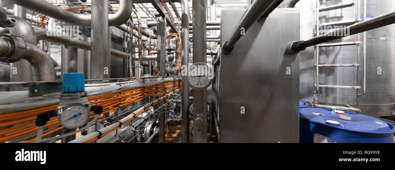 Industrial zone background concept. Equipment, pipelines and cables in ...