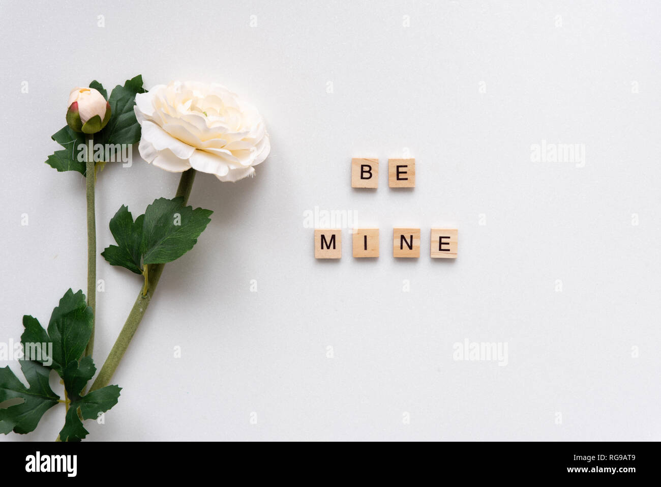 Be mine words on white marble background Stock Photo - Alamy