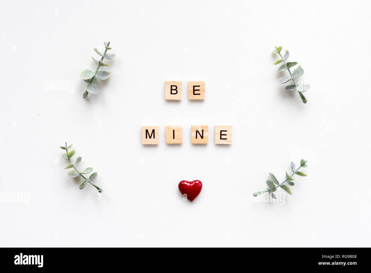 Be mine words on white marble background Stock Photo - Alamy