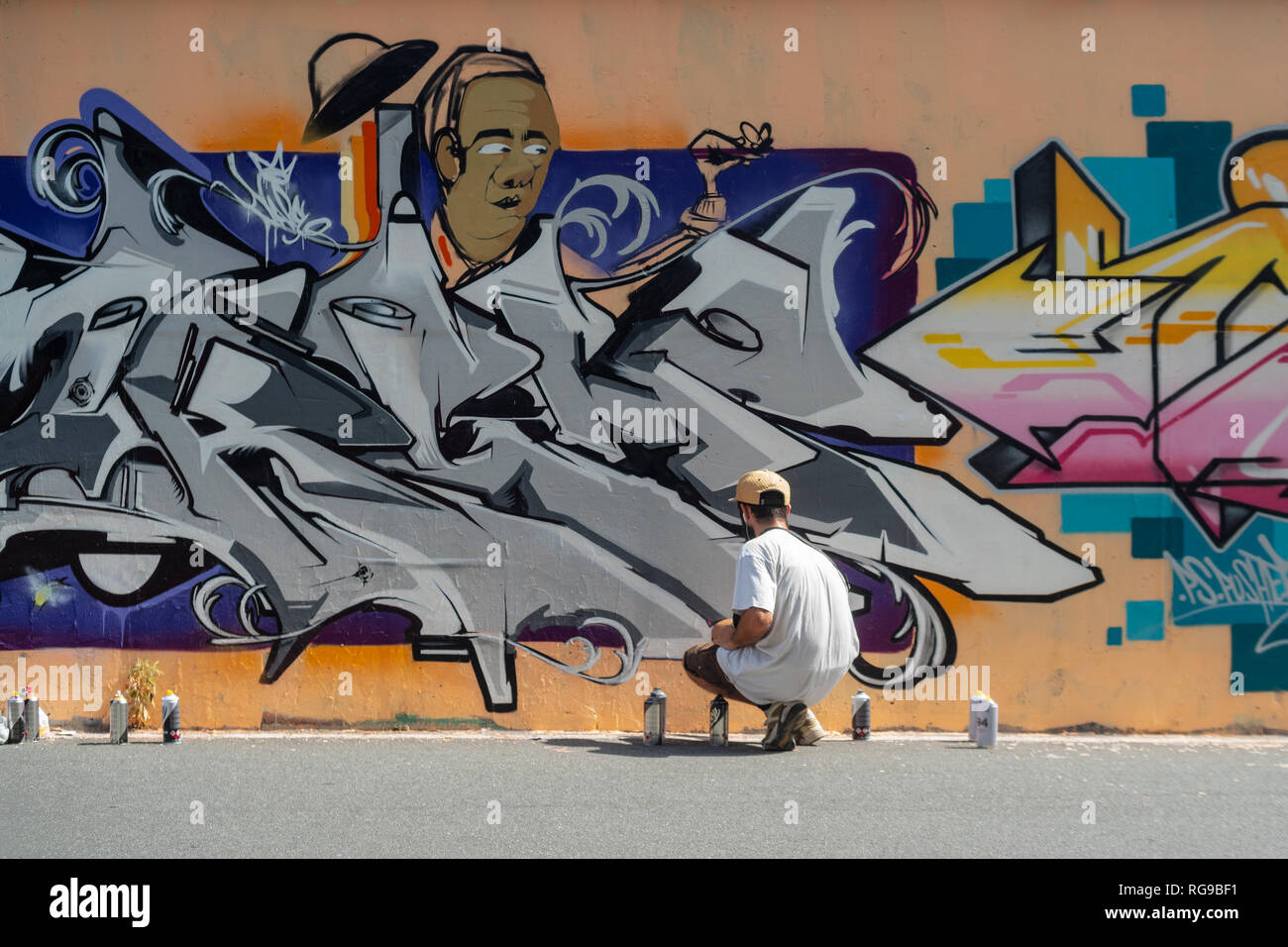 Person graffiti writing street art hi-res stock photography and images ...