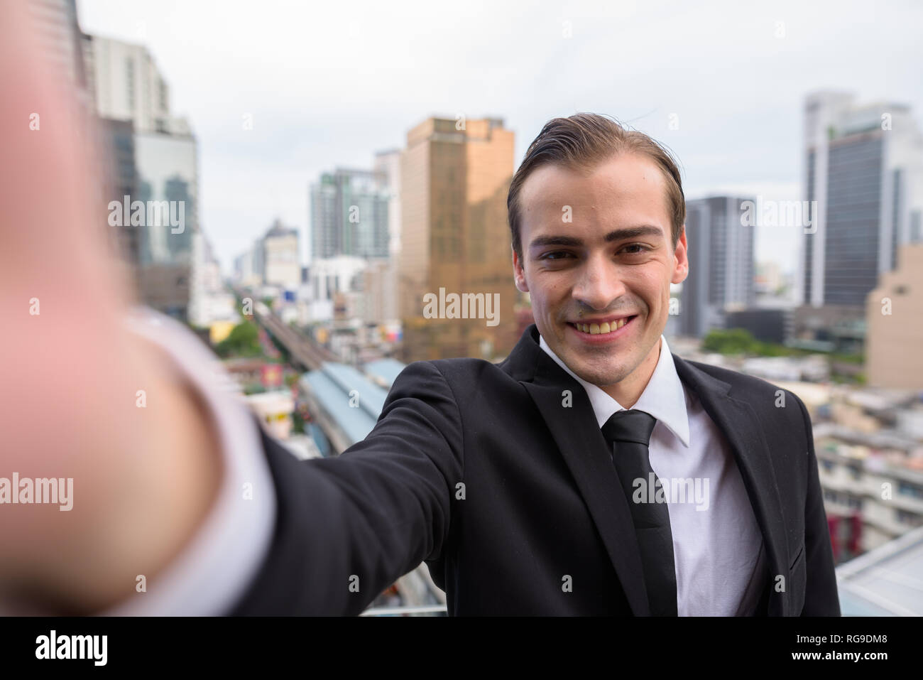 Personal point of view of businessman taking selfie with phone Stock ...