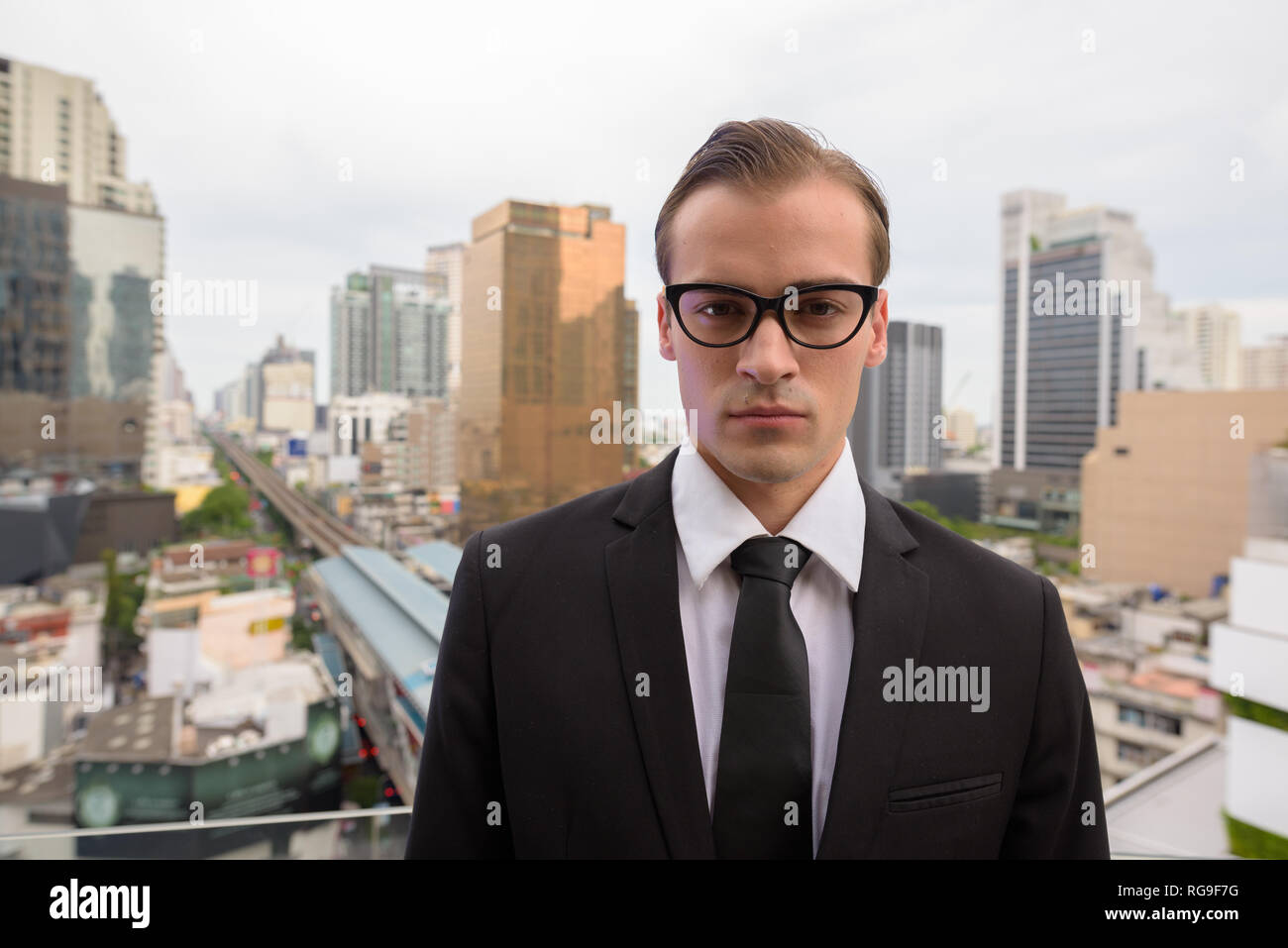 Young businessman exploring the city of Bangkok, Thailand Stock Photo ...