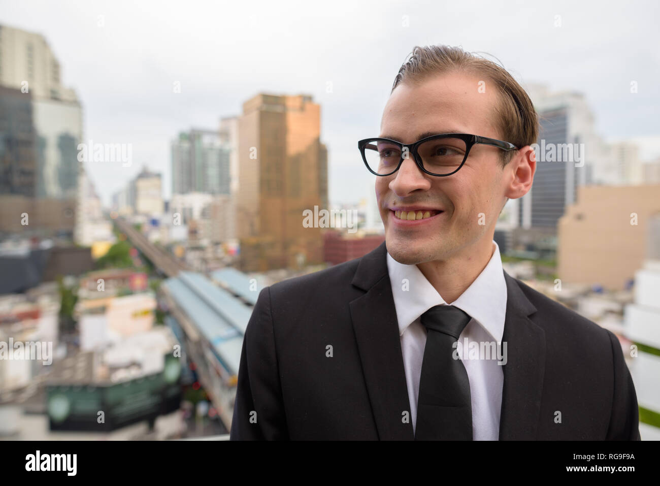 Young businessman exploring the city of Bangkok, Thailand Stock Photo ...