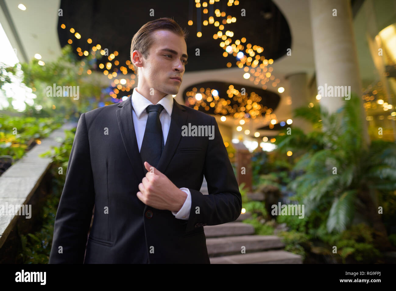 Business man walking stairs hi-res stock photography and images - Alamy