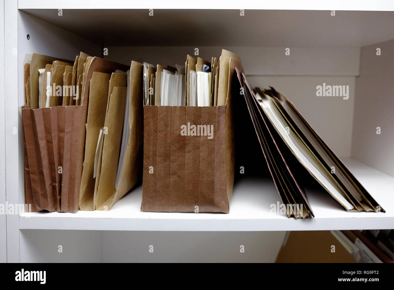 Business files in boxes folders and shelf papers Stock Photo - Alamy