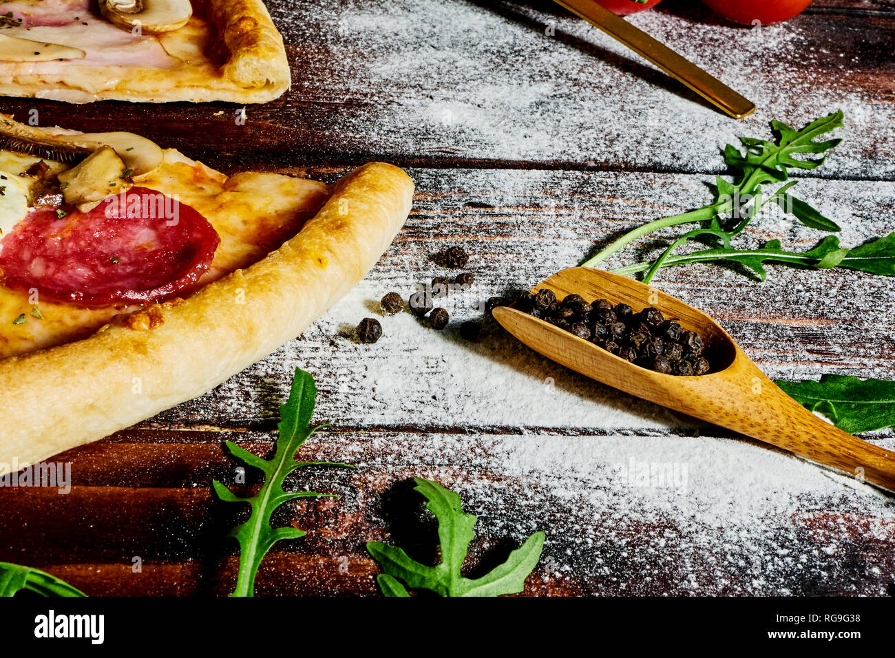Italian fast food. Delicious hot pizza sliced and served on wooden ...