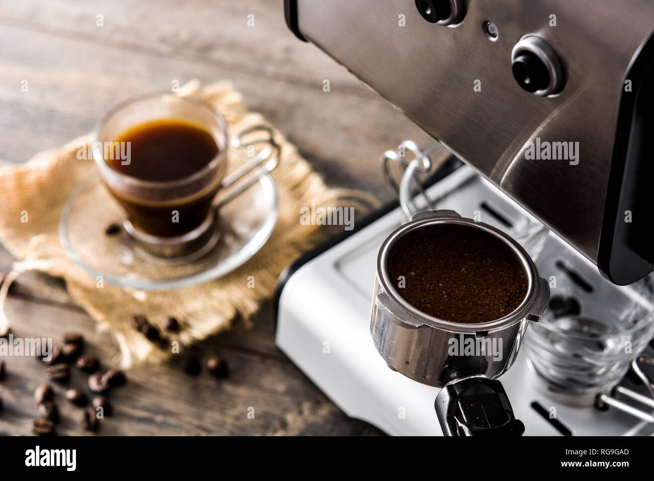Preparing coffee with espresso coffee machine Stock Photo - Alamy