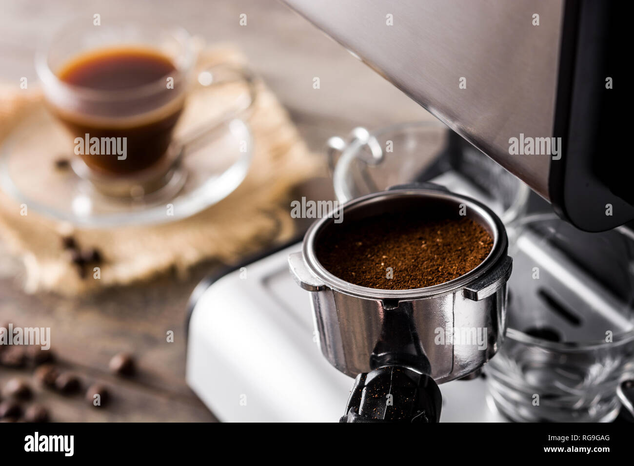 Preparing coffee with espresso coffee machine Stock Photo - Alamy