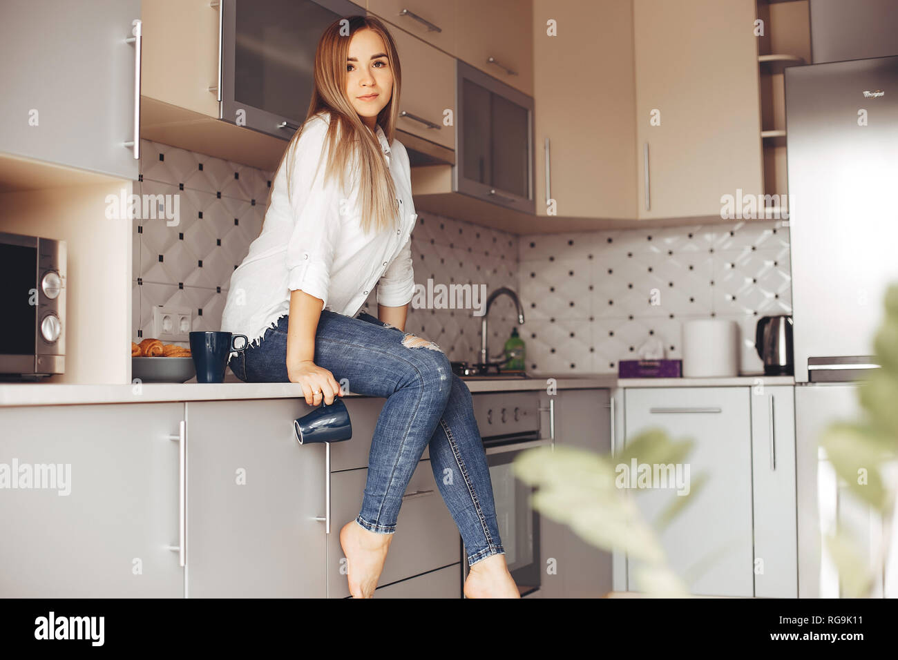 Beautiful girl at home Stock Photo - Alamy