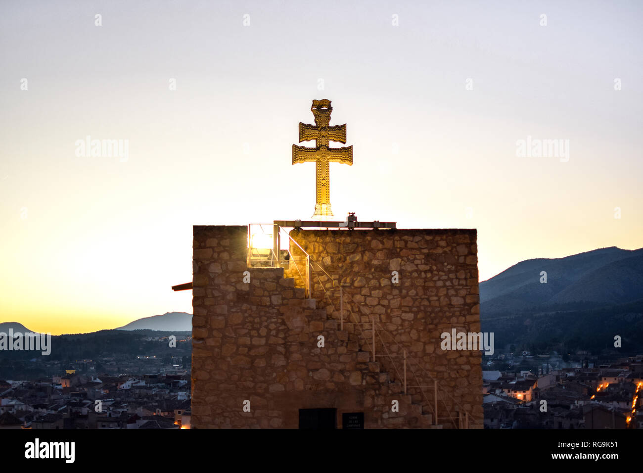 Ancient christian cross against the town of Caravaca, Spain Stock Photo ...