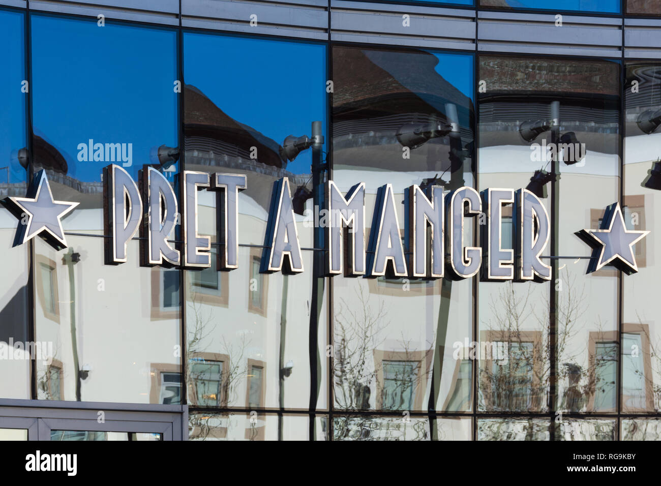 Pret A Manger sign on a window of the sandwich shop with reflections of ...