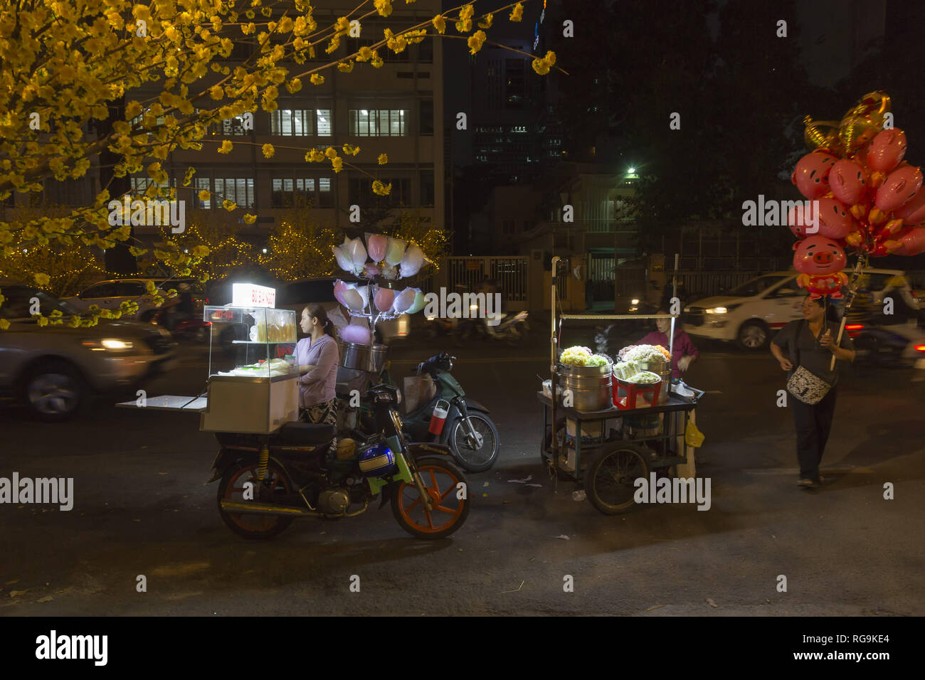 Saigon, Vietnam street night life Stock Photo - Alamy