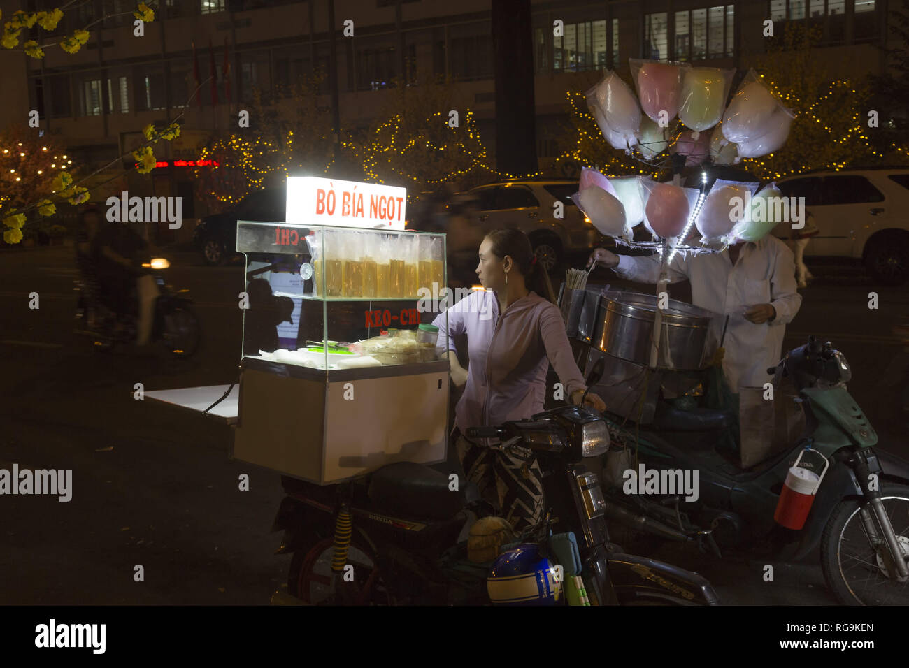 Saigon, Vietnam street night life Stock Photo - Alamy