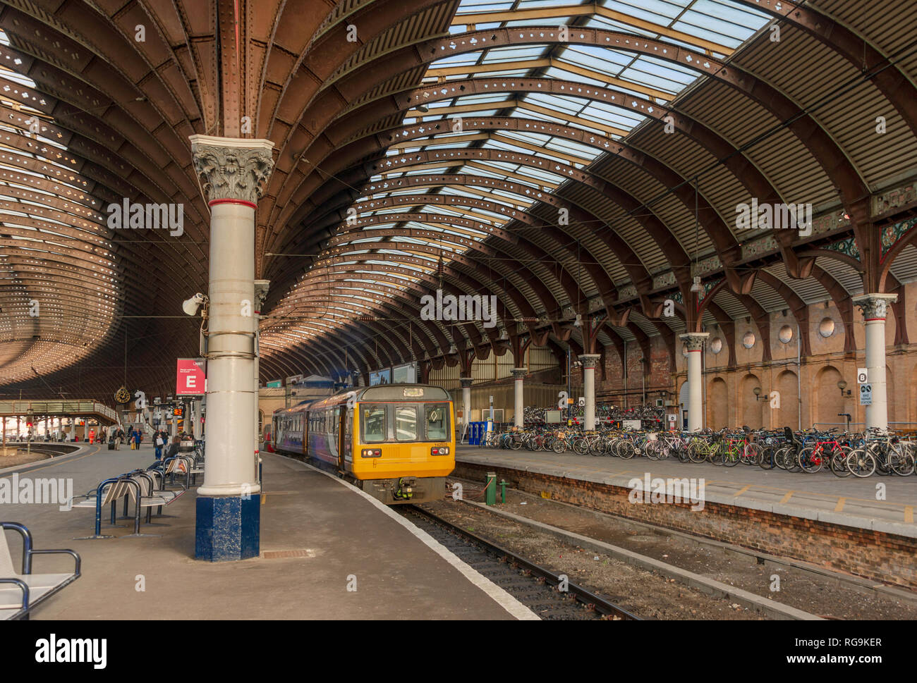 A platform on York Railway Station with a train waiting to depart. The ...