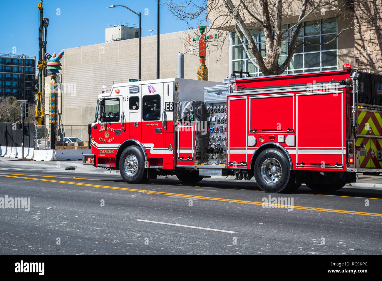 Fire engine rushing down city hi-res stock photography and images - Alamy