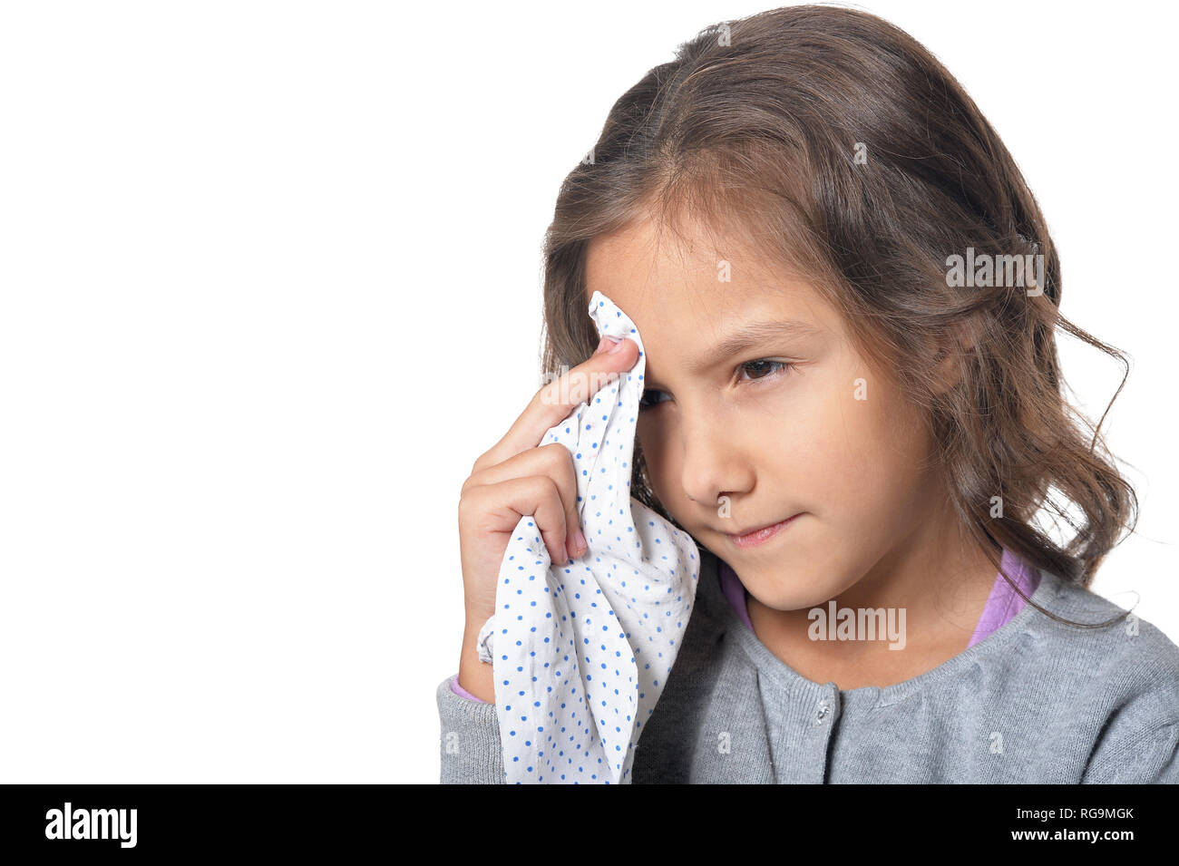 Portrait of sad little girl crying on white background Stock Photo - Alamy