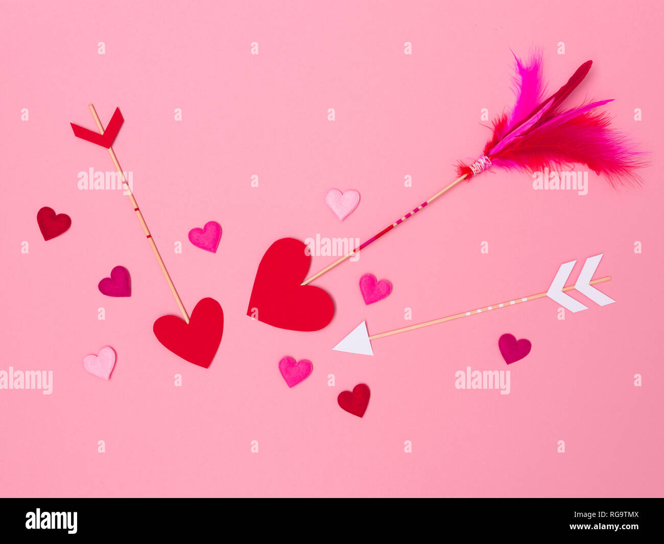 beautiful pink valentine background with love arrows and hearts Stock ...
