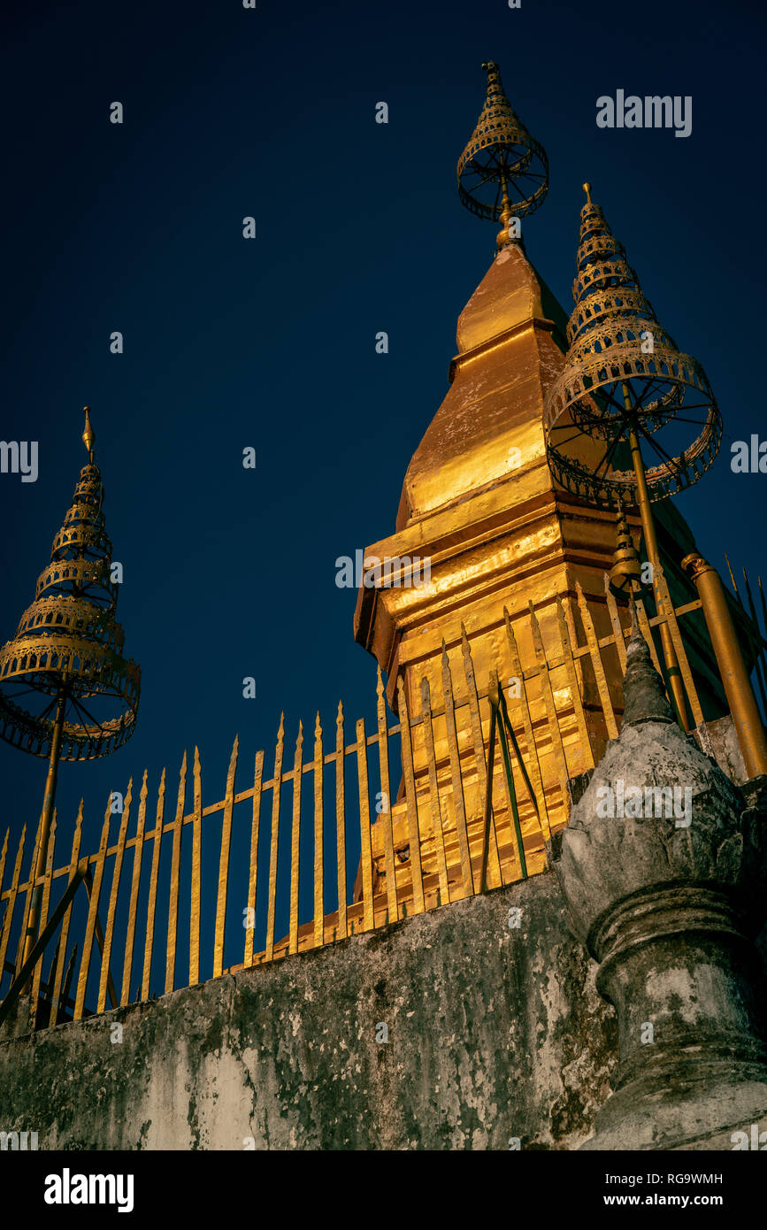 Top of Luang prabang. Mount phousi with sunlight hitting the temple ...