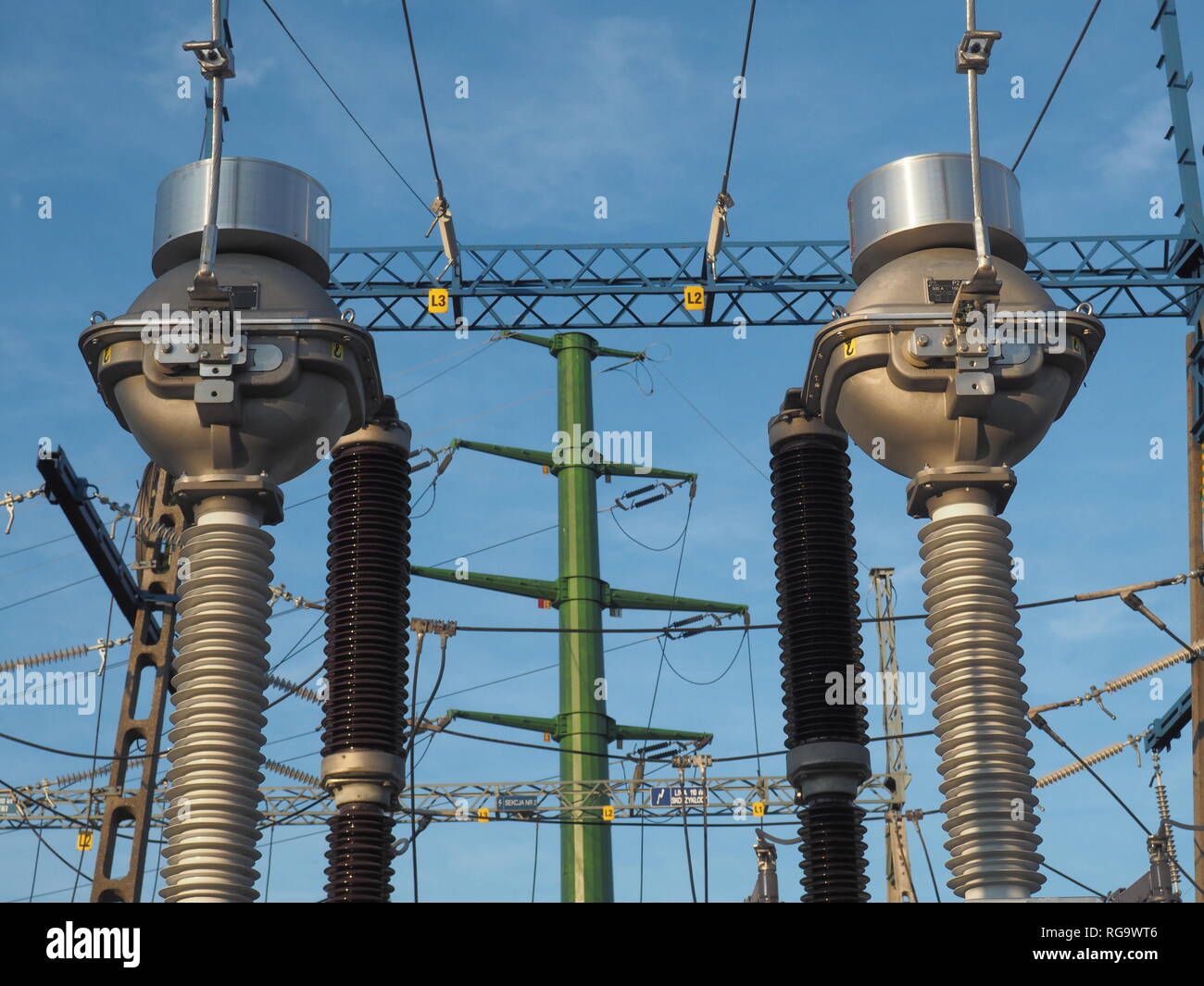 High voltage power substation at blue sky background Stock Photo - Alamy