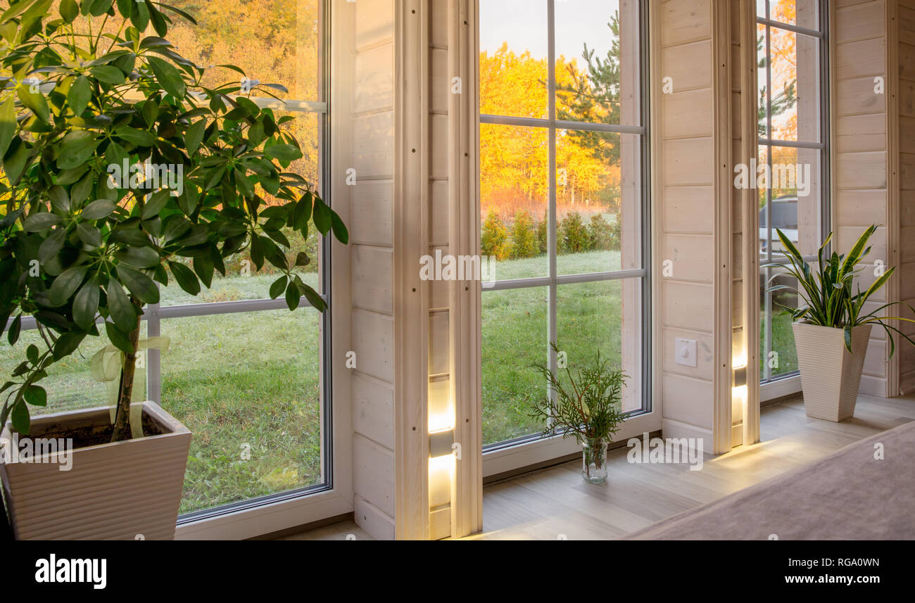 Bright photo studio interior with big window, high ceiling, white ...