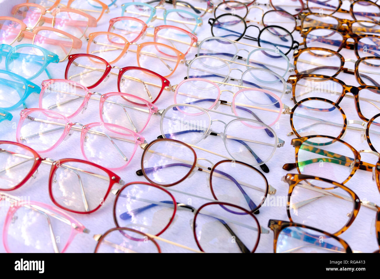 Lots of eyeglasses in retail shop Stock Photo - Alamy