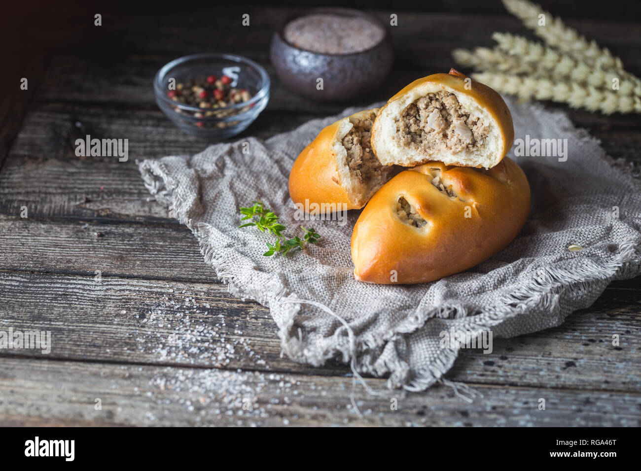 Traditional Russian Mini meat pies on rustic wooden background Stock ...