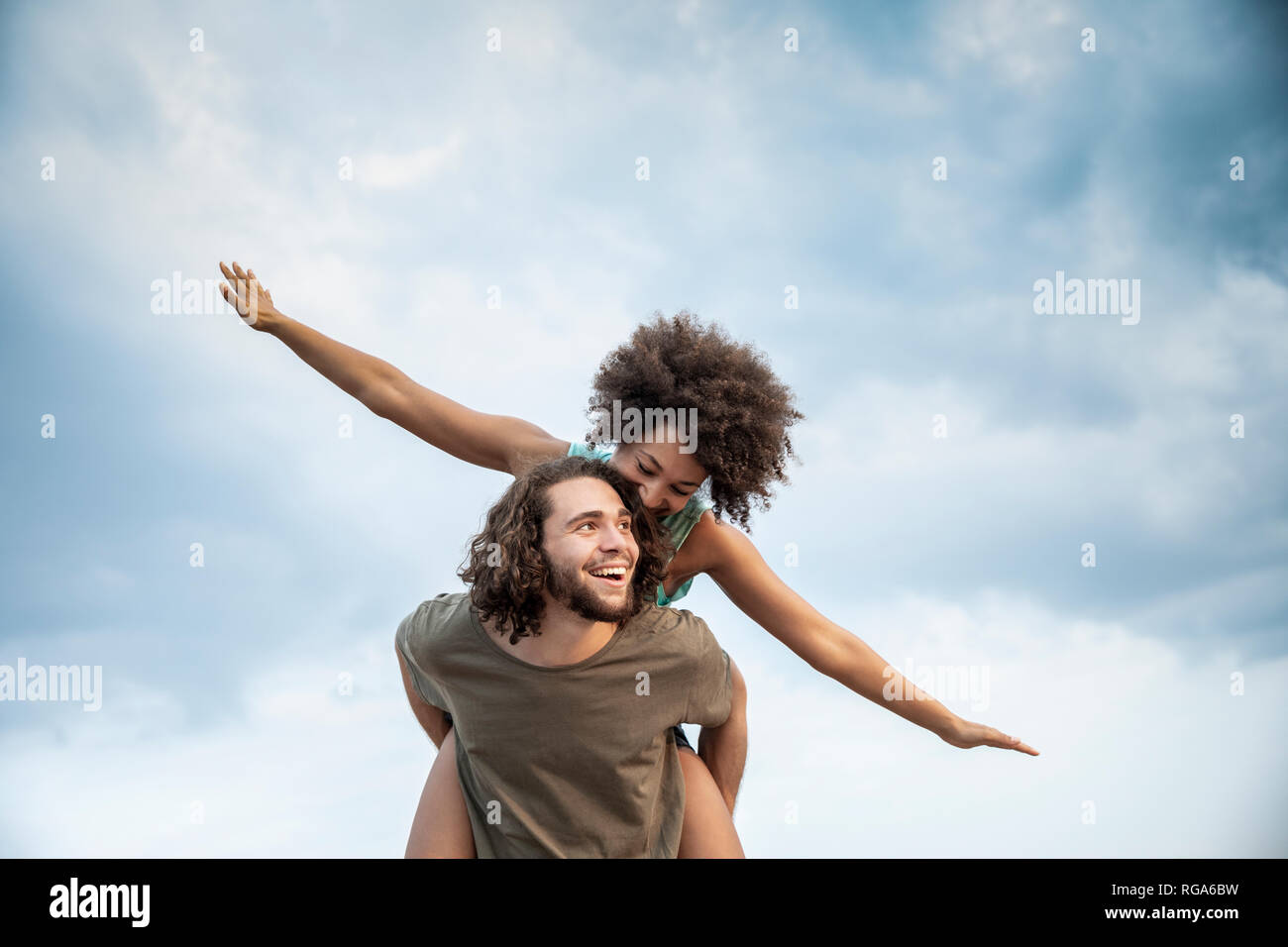 Happy carefree couple outdoors Stock Photo - Alamy