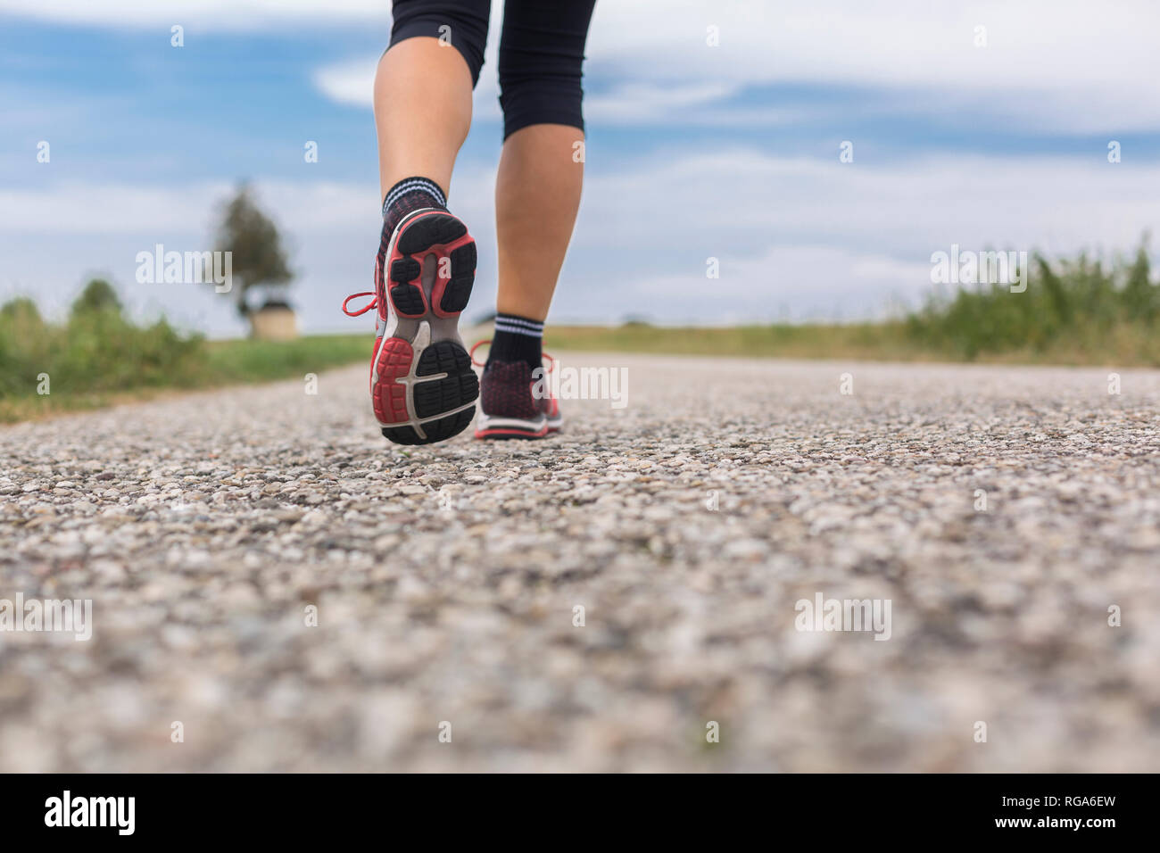 Woman lift the foot running hi-res stock photography and images - Alamy