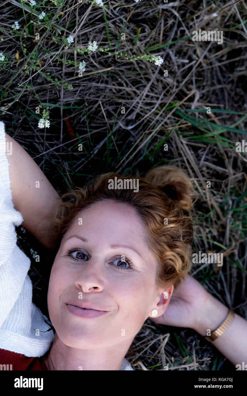 Woman lying ground hi-res stock photography and images - Alamy