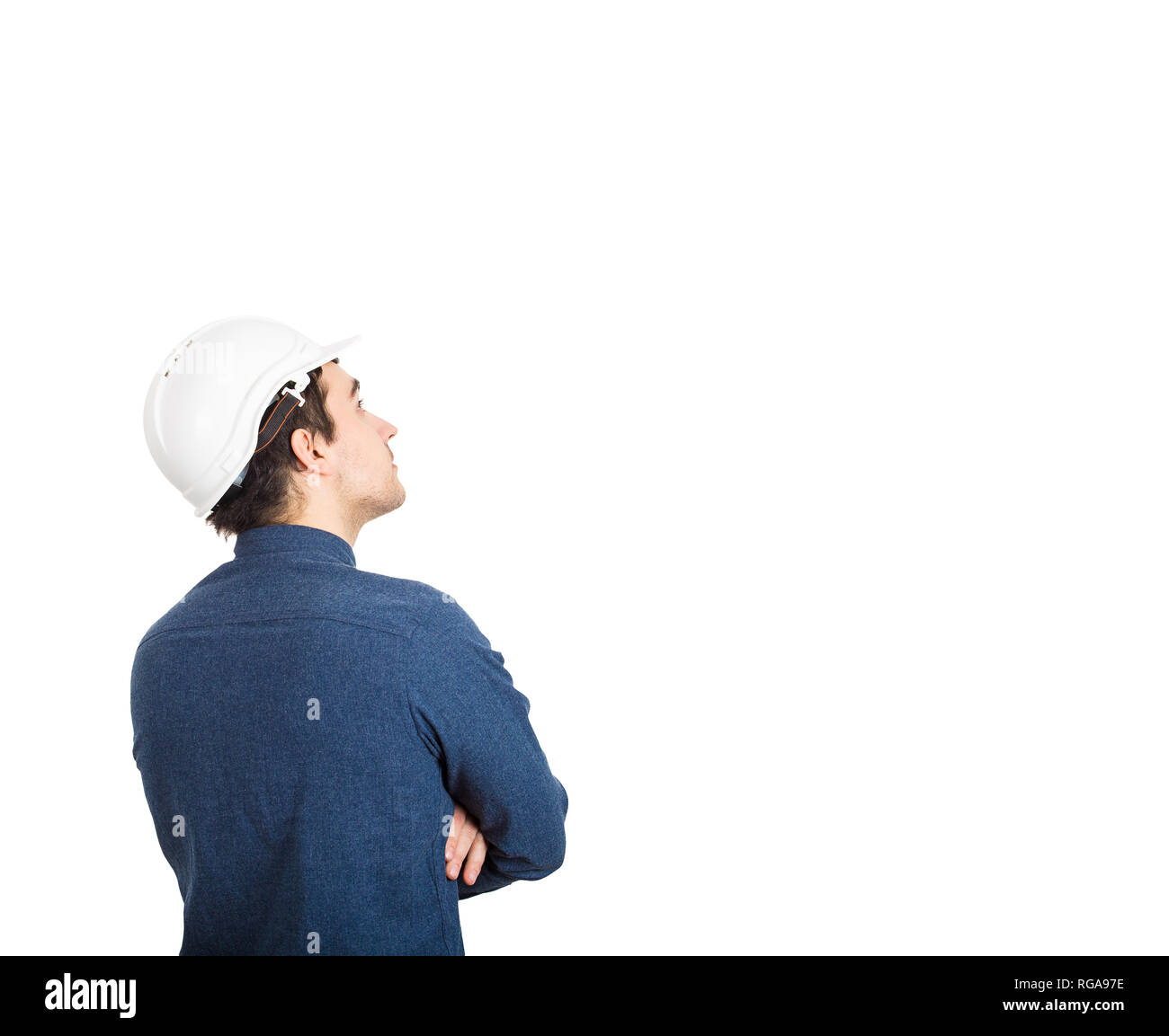 Side view of serious confident young man engineer wearing protective ...