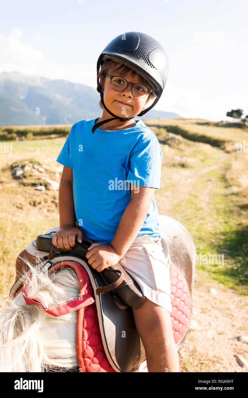 Pony boy riding hi-res stock photography and images - Alamy