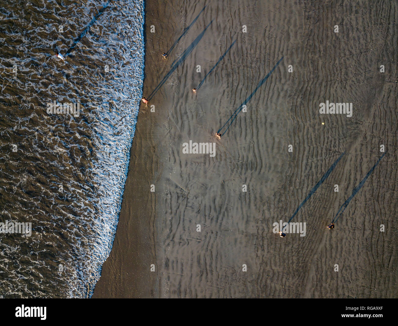 Indonesia, Bali, Aerial view of Jimbaran beach from above, people Stock ...