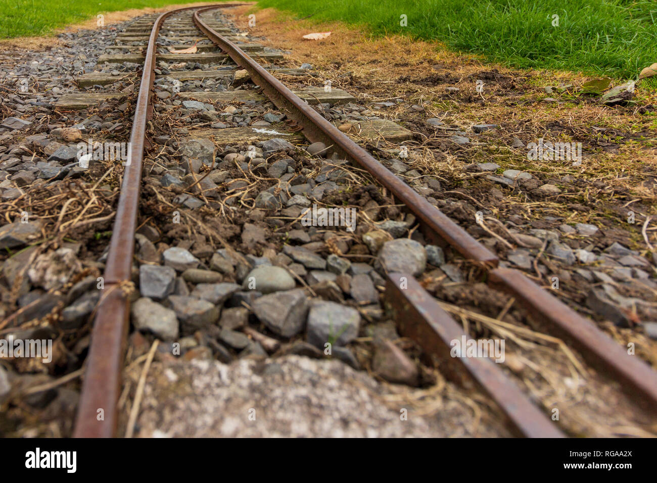 Low perspective image of narrow guage railroad tracks for a children's ...