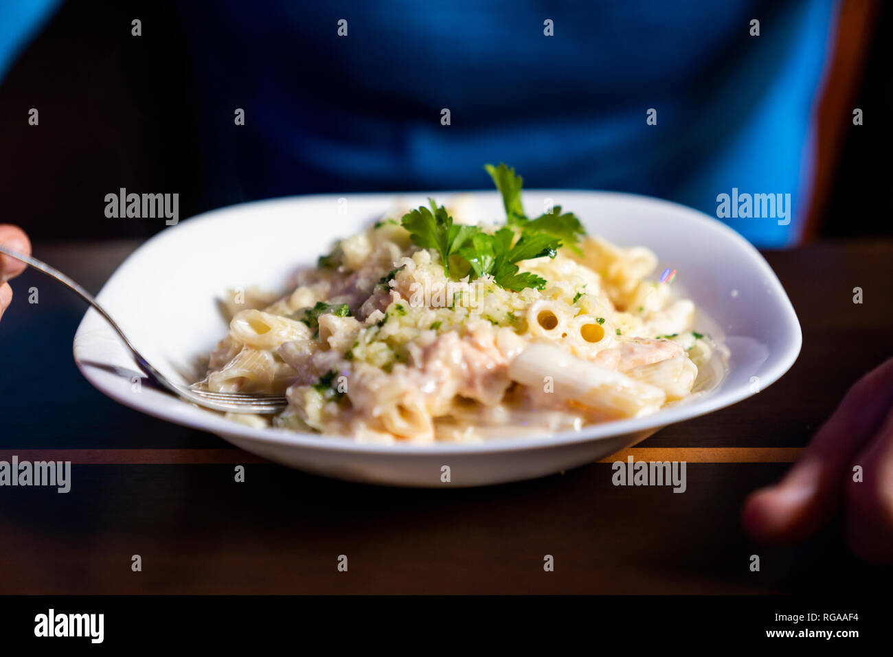 Athlete eating in table hi-res stock photography and images - Alamy