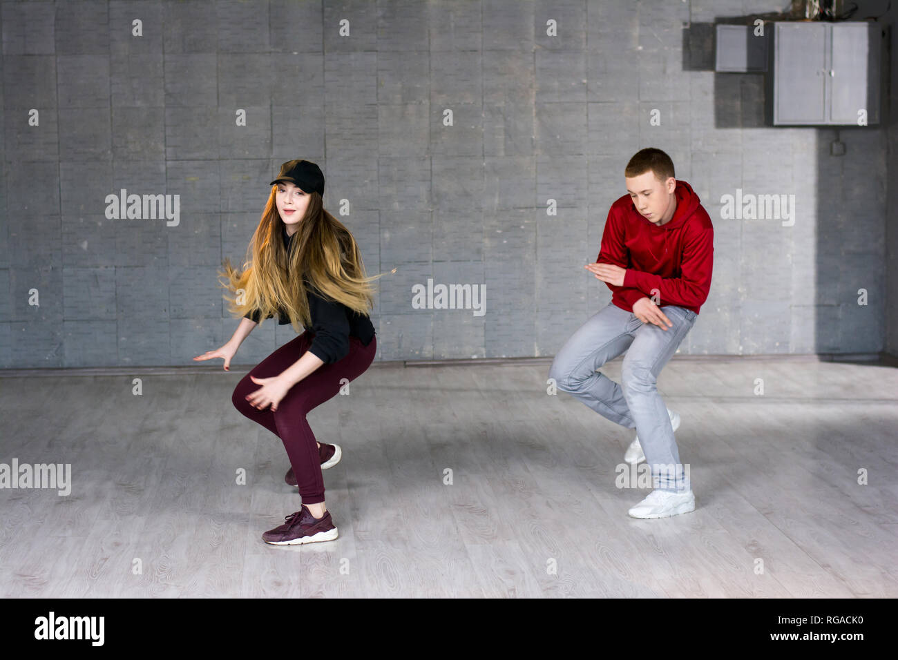 Attractive couple dancing social dance. Couple of young man and woman ...