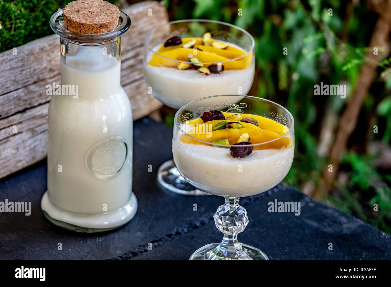 Mango coconut rice pudding Stock Photo - Alamy