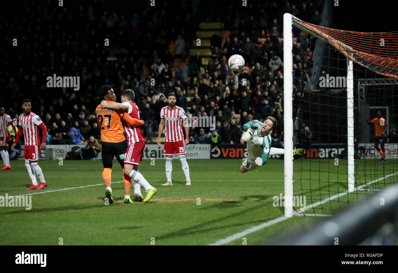 Brentford goalkeeper Luke Daniels saves a corner kick from Barnet's ...