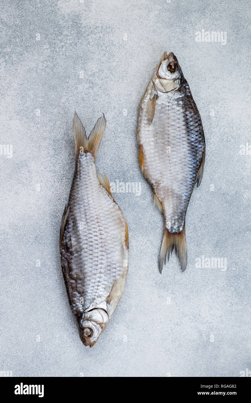 Dried salted fish on grey concrete background. Traditional Russian ...