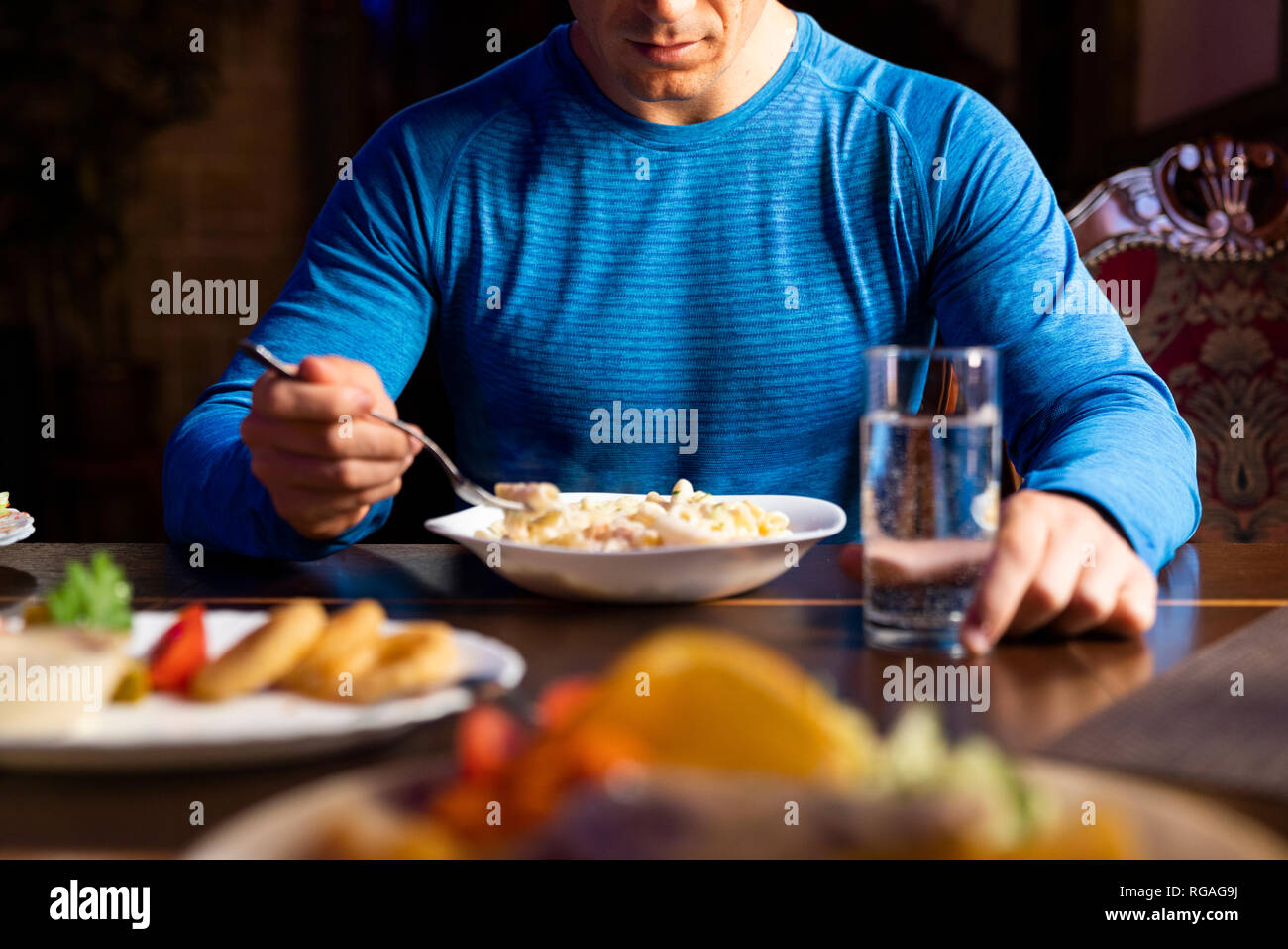 Athlete eating pasta hi-res stock photography and images - Alamy