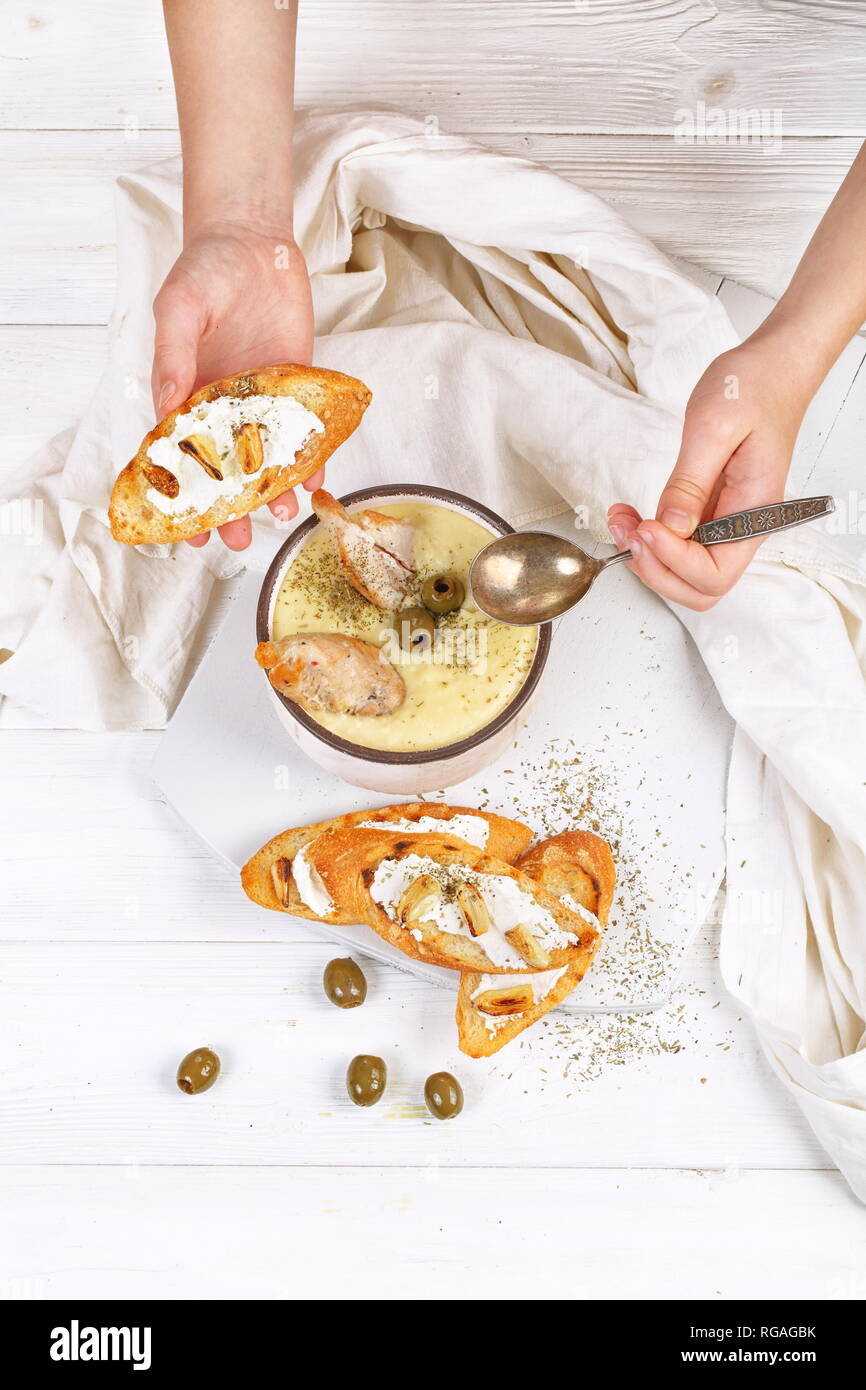 French puree soup with parsnip, soft cheese baguette. Holds a soft ...