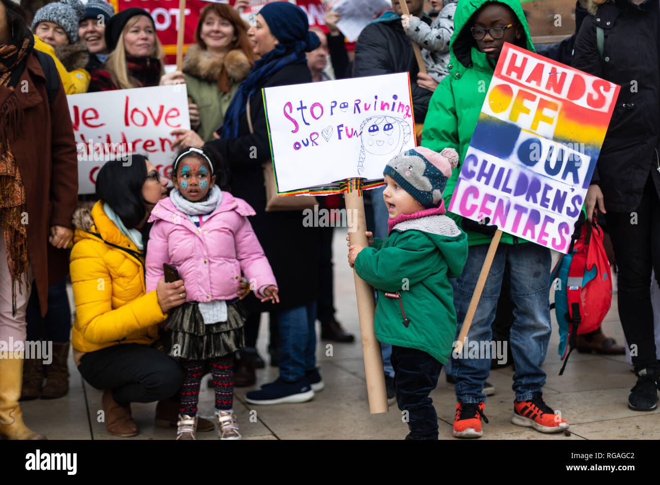 Parents and children stage a protest against the closure of Children's ...