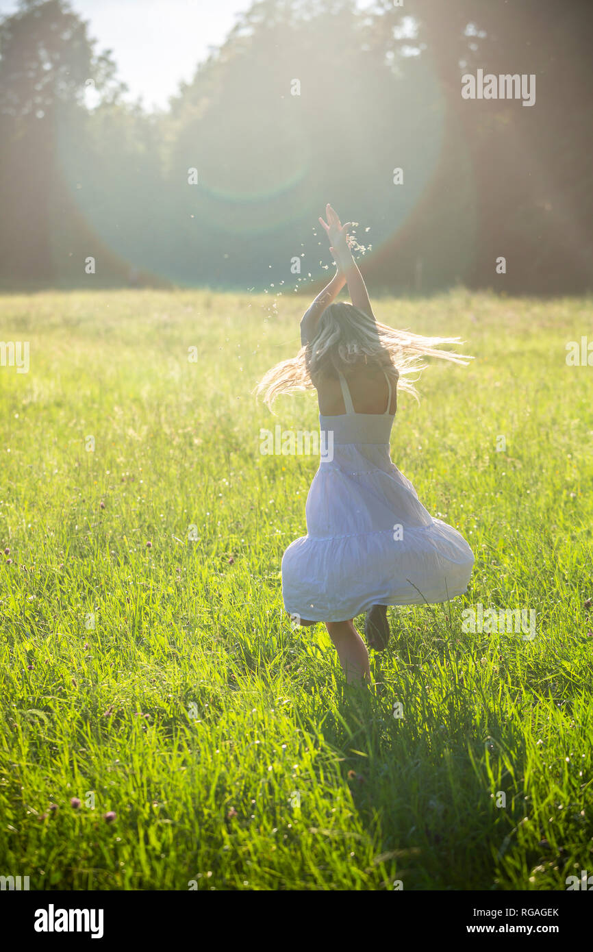 Happy girl dancing hi-res stock photography and images - Alamy