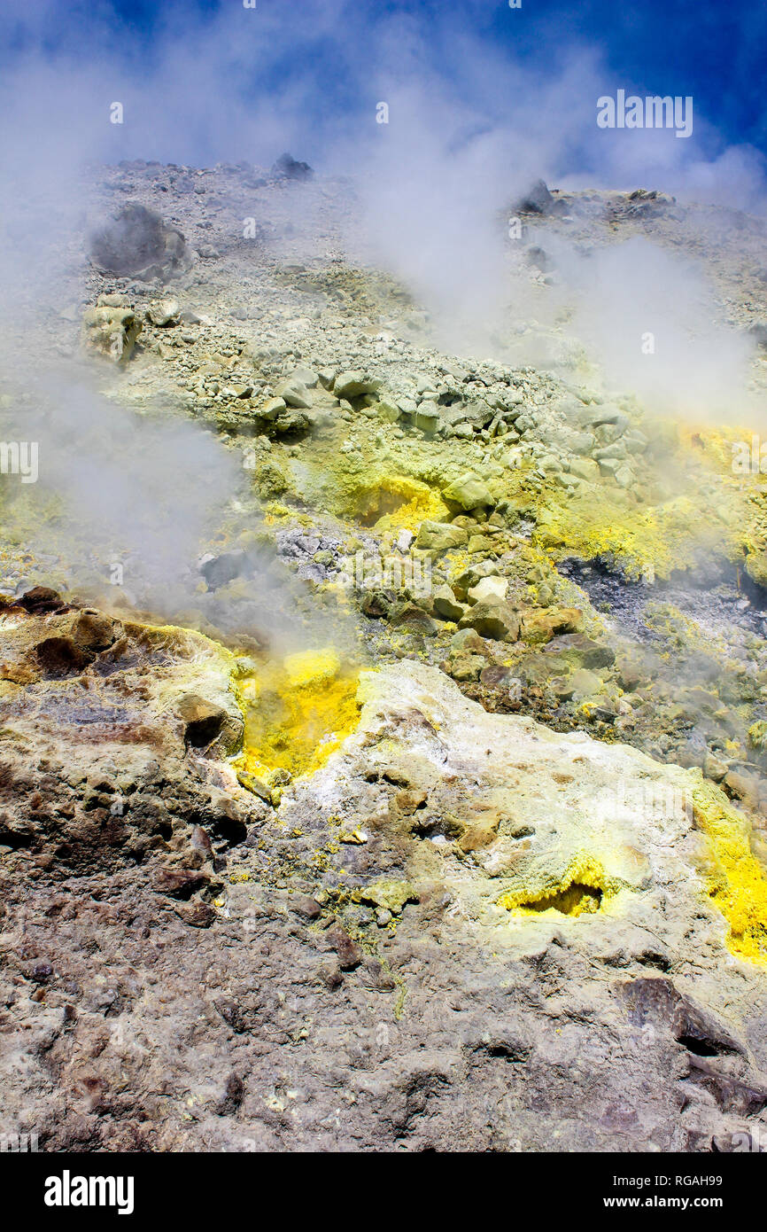 Steam of a volcanic spring with yellow sulphur, creating a very bad ...