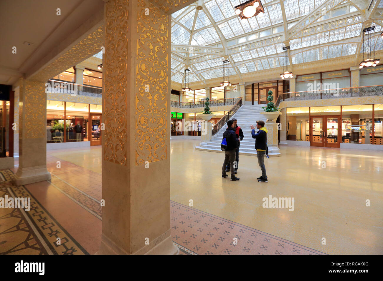 White marble with golden Persian-style ornamentation decorated the the ...