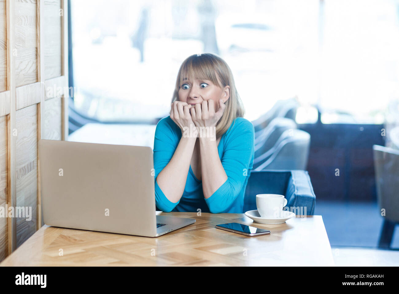 Scared! Side view portrait of emotional nervous young girl with blonde ...