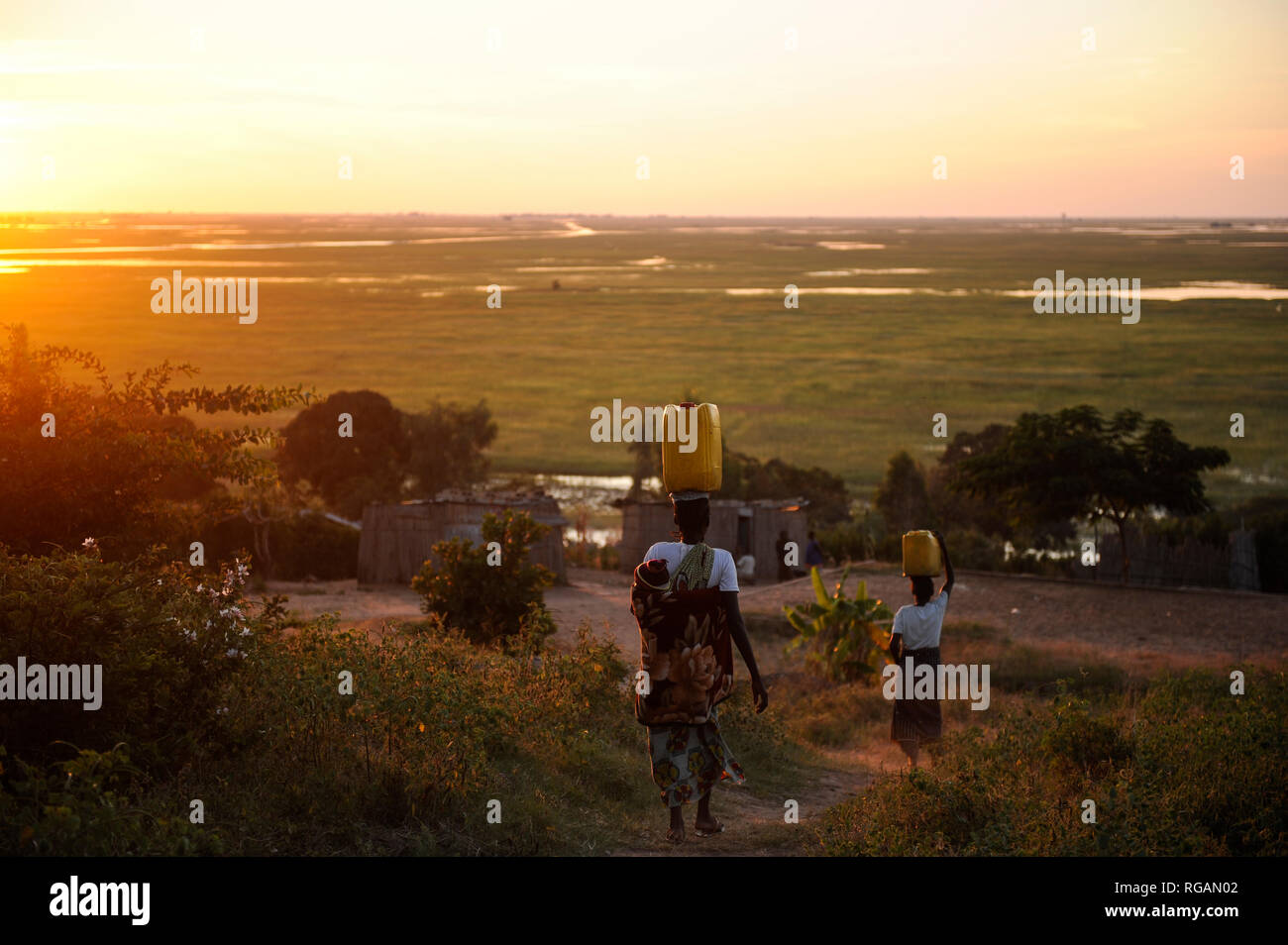 ZAMBIA Barotseland Mongu, Mulamba at river Zambezi flood plain, women ...