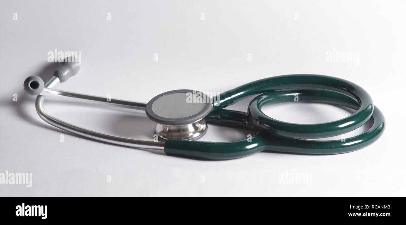 A green stethoscope on white background Stock Photo - Alamy
