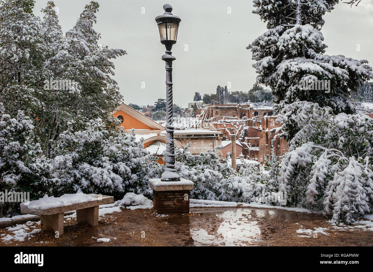 Winter in Rome. Snow falling on Roman Forum and Palatine Hill ancient ...